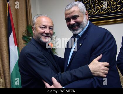 British lawmaker and activist George Galloway speaks to the press in ...