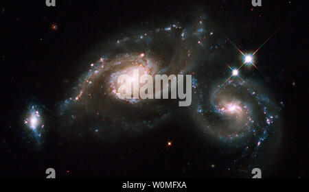 Overlapping galaxies. Hubble Space Telescope (HST) image of the overlapping galaxies known as ...