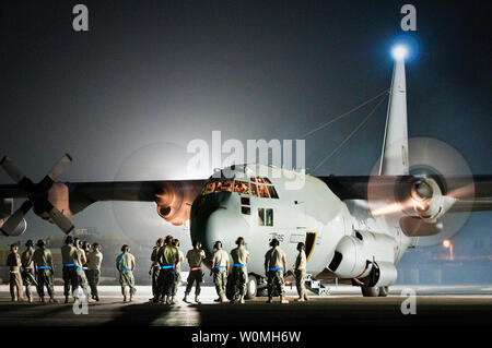 Aircrew from the 43rd Electronic Combat Squadron perform pre-flight ...
