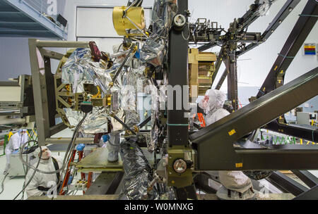 At Goddard Space Flight Center, engineers assemble a camera system for ...