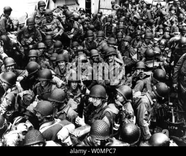 ENGLISH CHANNEL - 12 June 1944 - US Army troops crowded into an LCI as ...