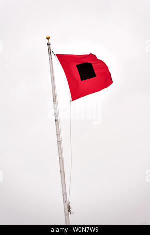 Rip currents flag on the beach Stock Photo - Alamy