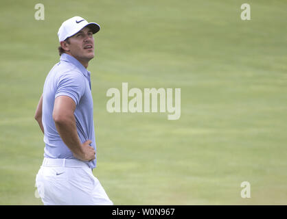 Brooks Koepka waits to hit on the first hole during the first round of ...
