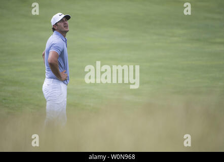 Brooks Koepka waits to hit on the first hole during the first round of ...