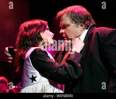 Meat Loaf (L) and Aspen Miller perform in concert at the Mizner Park ...