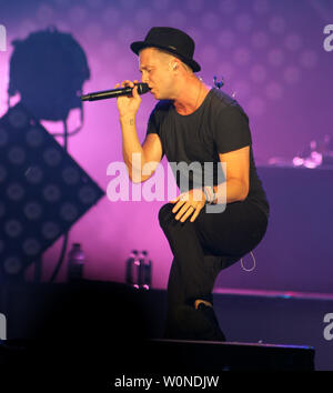 Ryan Tedder of OneRepublic performs at the Cruzan Amphitheater on ...