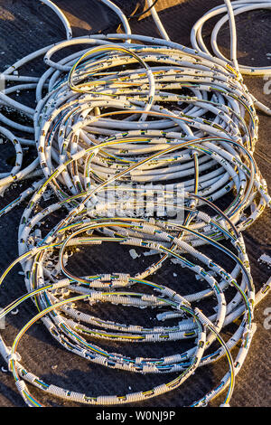 Old corroded flexible plastic conduit for electrical wiring Stock Photo ...