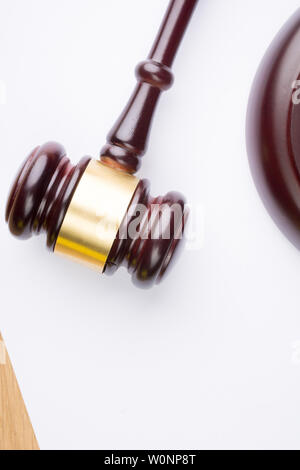 judge hammer on white paper and table Stock Photo - Alamy