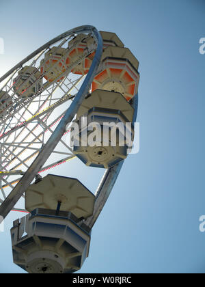 A Ferris wheel is an amusement ride consisting of a rotating upright ...