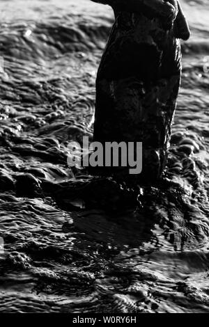 Amateur Spa treatment (mud baths, balneotherapeutic) is in a plastic ...