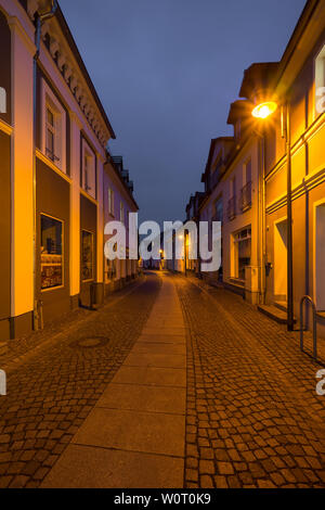 SENFTENBERG, GERMANY - FEBRUARY 08, 2018: Evening streets of the old ...