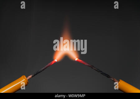 Electric arc between two cables Stock Photo - Alamy