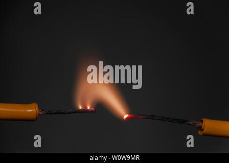 Electric arc between two cables Stock Photo - Alamy