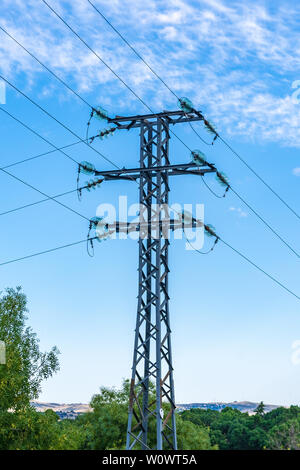 Small high voltage tower in the countryside Stock Photo - Alamy