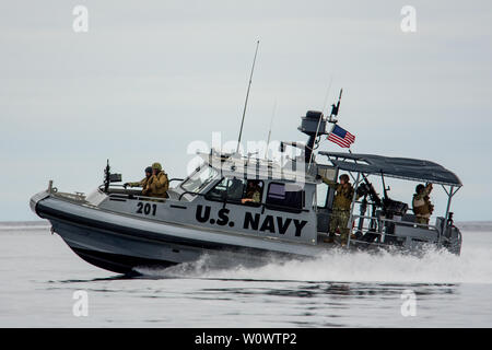 A SeaArk 34-foot Dauntless patrol boat provides security for a U.S ...