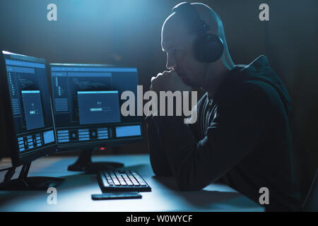hacker with progress loading bar on computers Stock Photo - Alamy