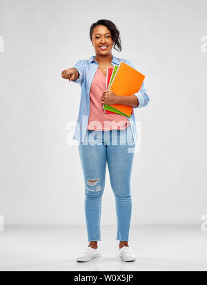 african american student woman with notebooks Stock Photo - Alamy