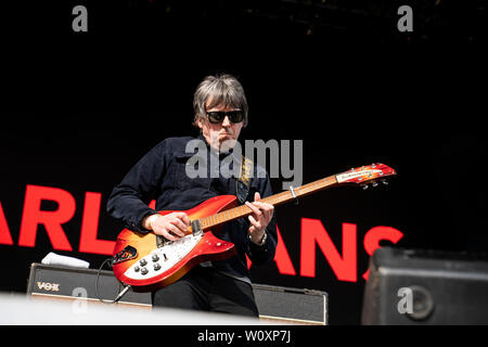 Mark Collins of the English rock band, The Charlatans playing guitar at ...