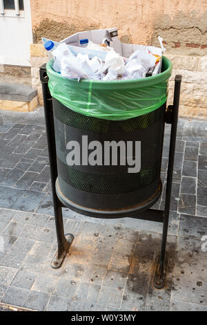 one full green litter bin in countryside Stock Photo - Alamy