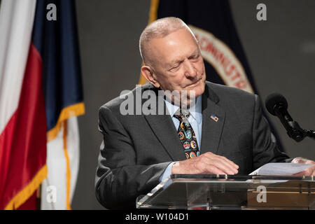 Retired Apollo 11 Flight Director Gene Kranz waves during a dedication ...