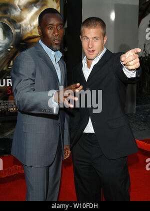 Don Cheadle & Scott Caan at the World Premiere of "The Bourne Supremacy ...