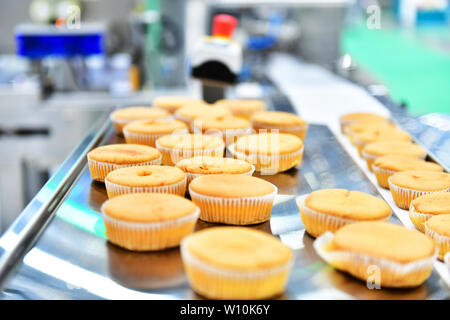 Automatic bakery muffins production line on conveyor belt equipment ...