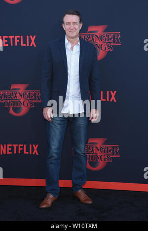 Joe Chrest arrives at Netflix's STRANGER THINGS 3 World Premiere held ...