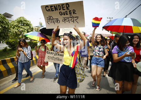 Kathmandu, Nepal. 29th June, 2019. Women from the LGBTIQ community hold ...