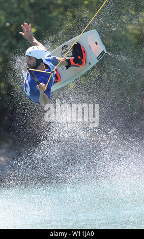 Mengen, Germany. 29th June, 2019. Stoyan jumps headfirst into the water ...