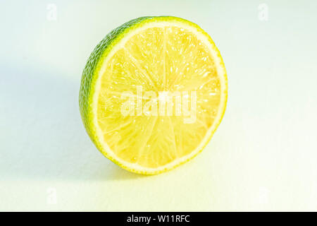 fresh lime fruits cut open, food Stock Photo - Alamy