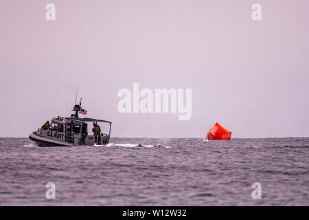 A SeaArk 34-foot Dauntless patrol boat provides security for a U.S ...