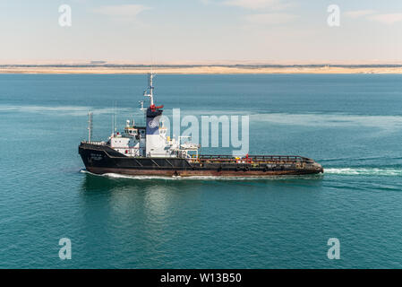 Suez, Egypt - November 5, 2017: Tug Ezzat Adel vessel passing the New ...