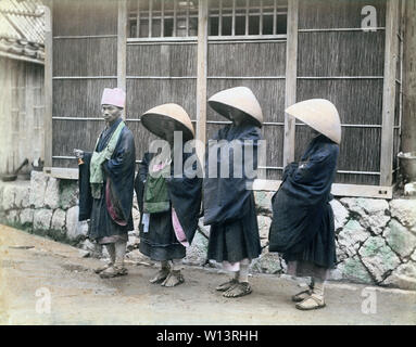 Japanese buddhist Monks wearing traditional bright orange silk robes at ...