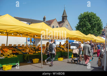 Market stalls, Buttermarket, Bury St Edmunds, Suffolk, England Stock ...