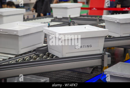 Sorting system with conveyer belt in distribution warehouse Stock Photo ...
