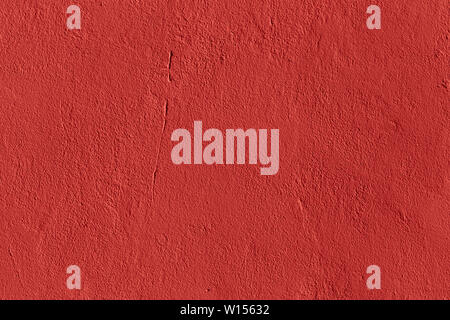 flat live coral color plaster wall matte texture Stock Photo - Alamy
