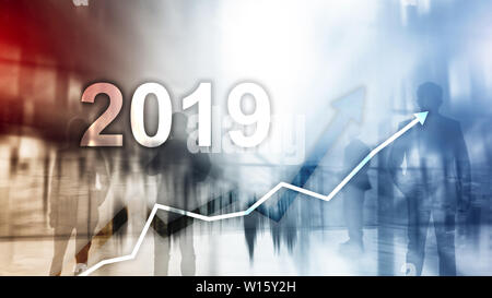 New year 2019 Financial growth graph on blurry business background ...