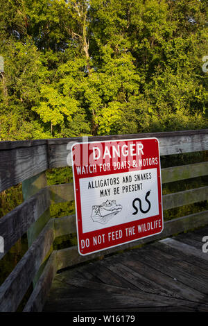 Alligator and Snakes Warning sign Stock Photo - Alamy