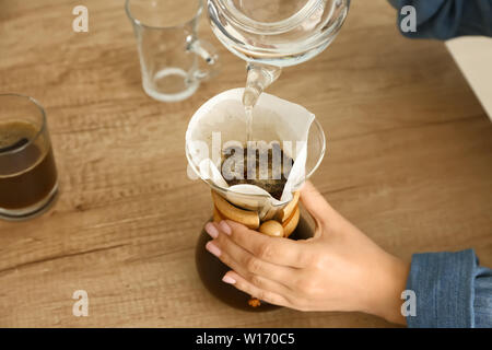 Preparing of tasty coffee in chemex on table, closeup Stock Photo - Alamy