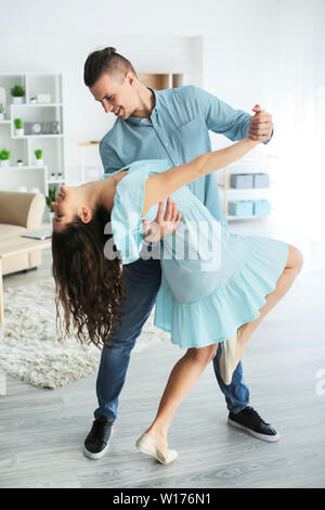 Adorable loving couple dancing at home Stock Photo - Alamy
