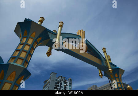 The main gate at the Taman Haji Sir Muda Omar Ali Saifuddien field in ...