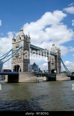 London's iconic Tower Bridge in its raised position Stock Photo - Alamy