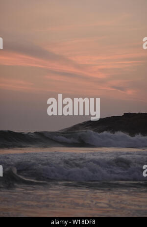 Waves & Light house at Koval beach, Kerala, India Stock Photo - Alamy