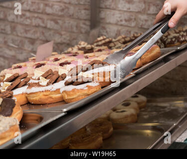 Pick up doughnut Stock Photo - Alamy