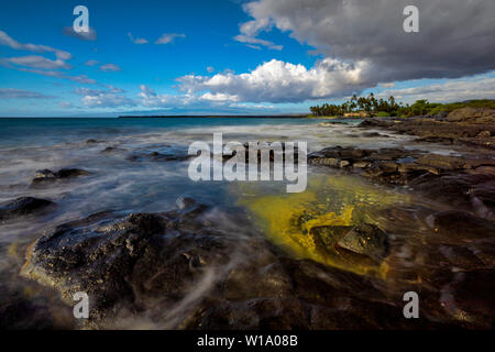 Natural coastal landscape with tide pools and the Ifaz rock in the ...