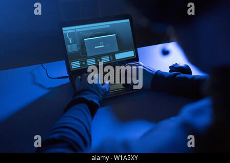 hacker with progress loading bar on computers Stock Photo - Alamy