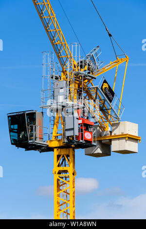 Operators cab of a yellow tower crane Stock Photo - Alamy