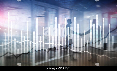 Business and economics concept. On financial statements and charts ...