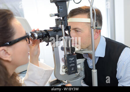 Optometry equipment for measuring intraocular pressure, etc Stock Photo ...