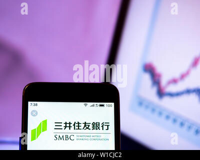 In this photo illustration, the Sumitomo Mitsui Trust Group logo seen ...
